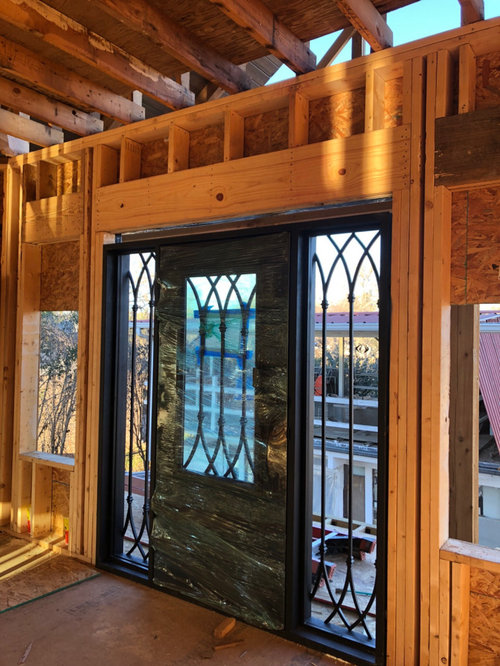 Front door lower than windows so tops don’t align, uneven