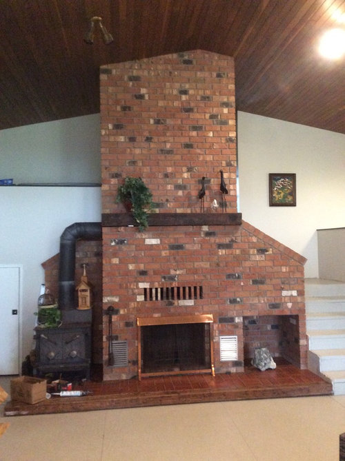 Massive red brick fireplace