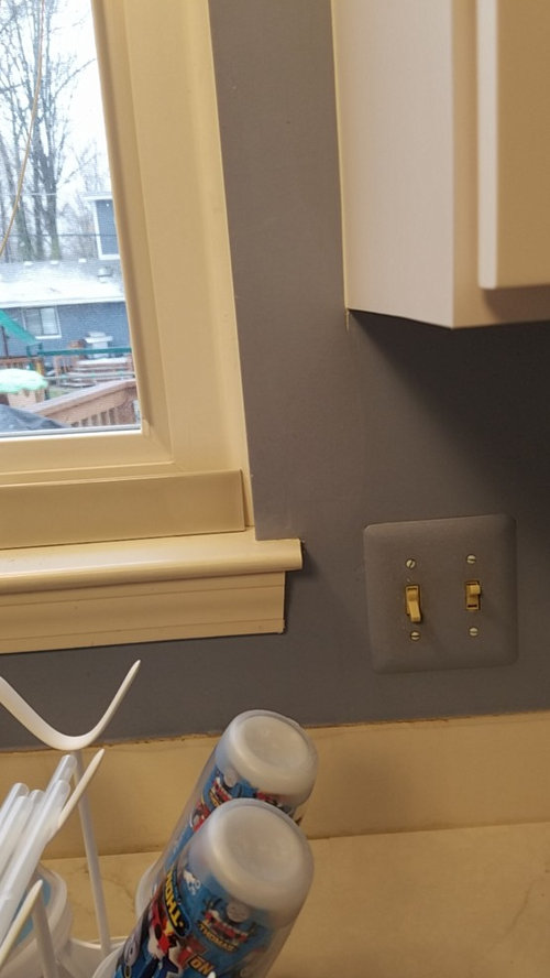 Metal edging with ceramic tile backsplash?