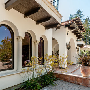 75 Beautiful Adobe Exterior Home With A Hip Roof Pictures & Ideas ...