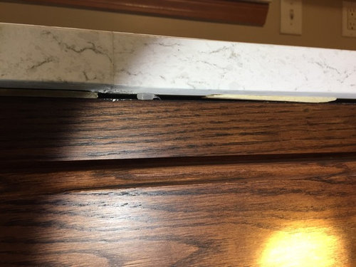 Gap between quartz countertop and cabinets