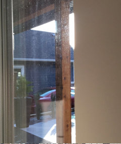 White haze on brand new sliding glass door