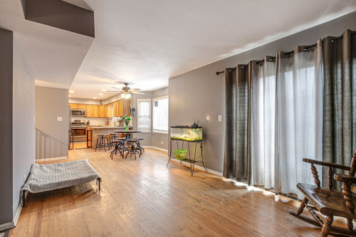 Narrow family room with too many doors