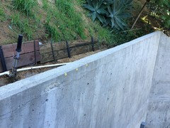 Concrete Retaining wall spalling - Seeking Solutions