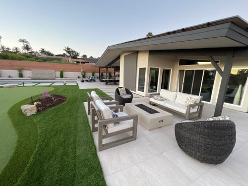 Ugh! How to cover an ugly post base with weird dimensions?