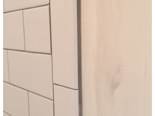 Is this a bad tile install? Any hope of fixing?