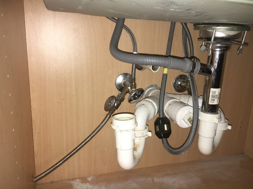 How to hook up sink to pipes