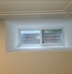 Permanently removing below grade basement windows