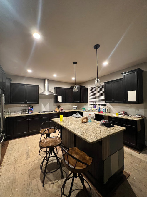 How to take my staggered cabinets to the 9ft ceiling?