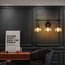 3-Light Black and Antique Gold Vanity With Clear Glass Shades ...