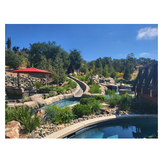 A Lazy River Pool in a Fantasy Setting - Rustic - Pool - San Francisco ...