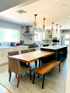 Combining kitchen island and dining area vs island and table