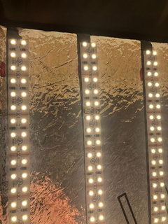 Placing a backlit onyx slab in shower wall