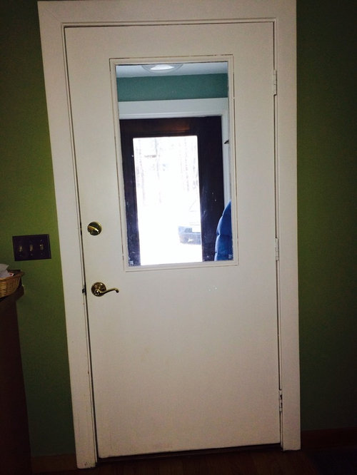 Window covering for glass front door and vestibule