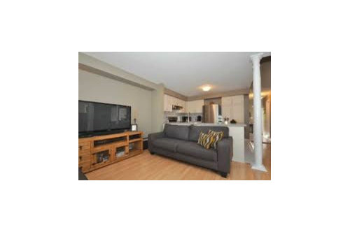 15x11 Living Room with Kitchen Counter with sink on one long wall