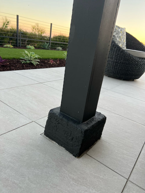 Ugh! How to cover an ugly post base with weird dimensions?