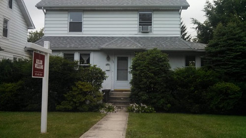 First house, boring front exterior, and insane front landscaping.