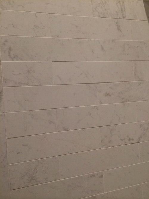 bathroom tile bowed and uneven