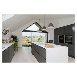 Open plan kitchen dining with feature gable glazing - Contemporary ...