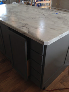 Wilsonart/Formica or granite/solidsurface?