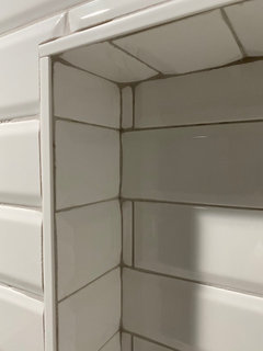 How do I lay a 8”x24” tile in shower?