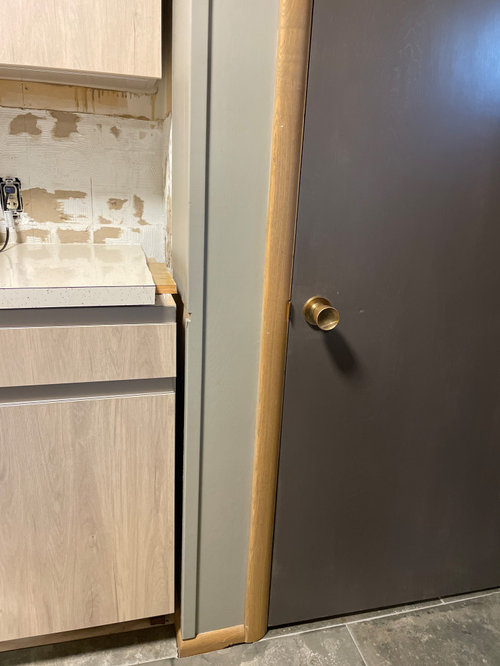 Infill gap ideas for spaces around cabinets tween walls and ceiling?