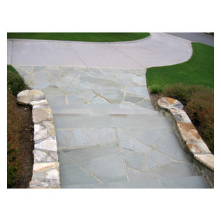 Grand staircase landings, cheek walls and columns; Mahogany driveway ...