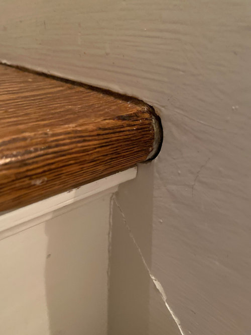 Gap between stair floor and wall