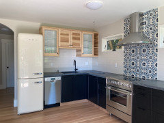 any ideas how to hide a fridge in cabinet