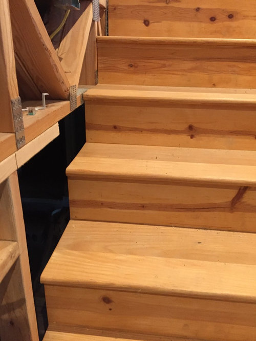 Truss up against stairs.How to trim it out?