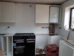 Safety regulation - between gas hob & wall cabinets. Need quick advice ...