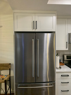 Big oops on the refrigerator cabinet/ceiling?