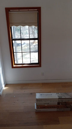 Stained wood baseboard/trim to match floors or painted base?