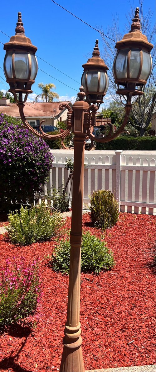 rusted lamp post
