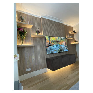 Floating tv unit with floating shelves wall panelling - Mediterranean ...