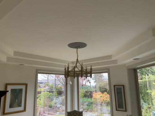 tray ceiling with rounded edges are dating my dining room.