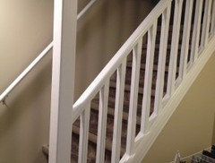 What to do with the gap between the railings and staircase?