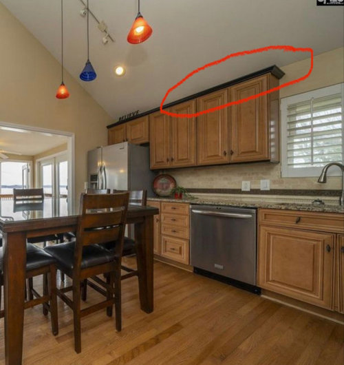 cabinets in kitchen with vaulted ceiling