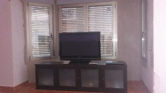 Window behind tv unit store