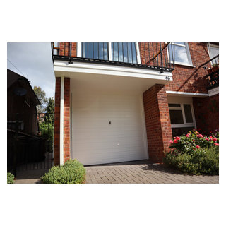 Front exterior - garage door, hand rail, and railing in West Wimbledon ...