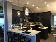 Fix a chopped up kitchen space into a dream kitchen for a family.