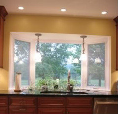 Kitchen faucet off-center with window; design dilemma, help!