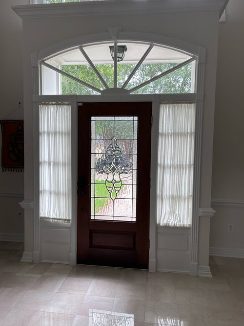 window solution for arch above front door