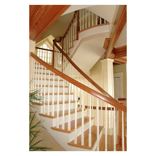 Custom Circular Switchback Staircase with Stained and Painted Wood ...