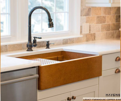copper sink with white quartz countertop