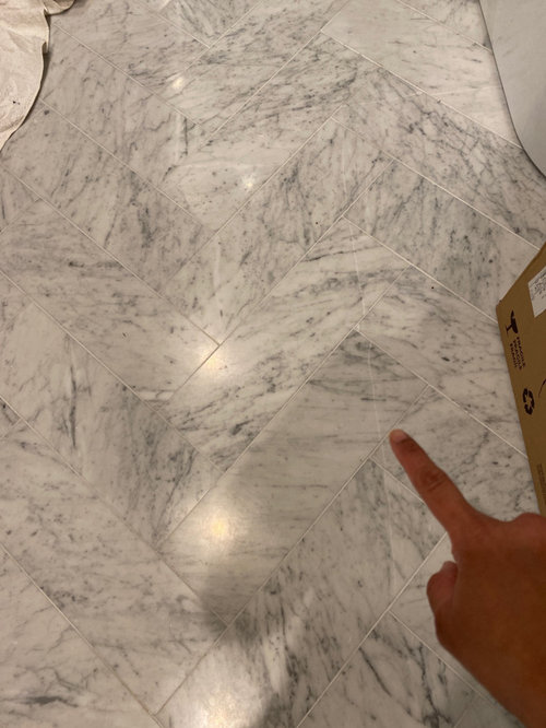scratches in marble after dragging items on the floor