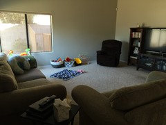 Off center couch in front of window -help?