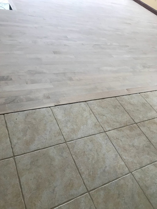 new hardwood matching old tile