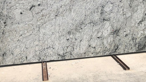 Bathroom Finishes - Navy Vanity, Granite, and Tile