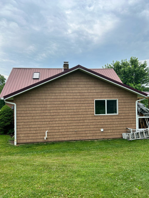 siding to match a maroon metal roof